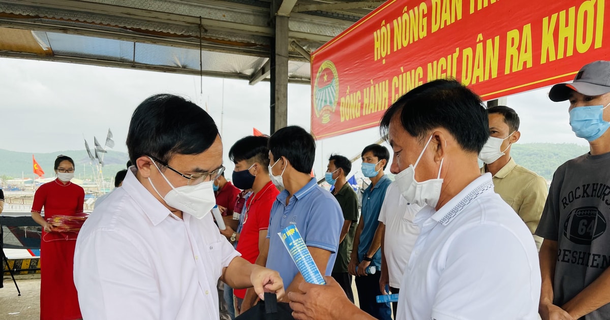 Presenting the national flag and first-aid kits to fishermen venturing ...